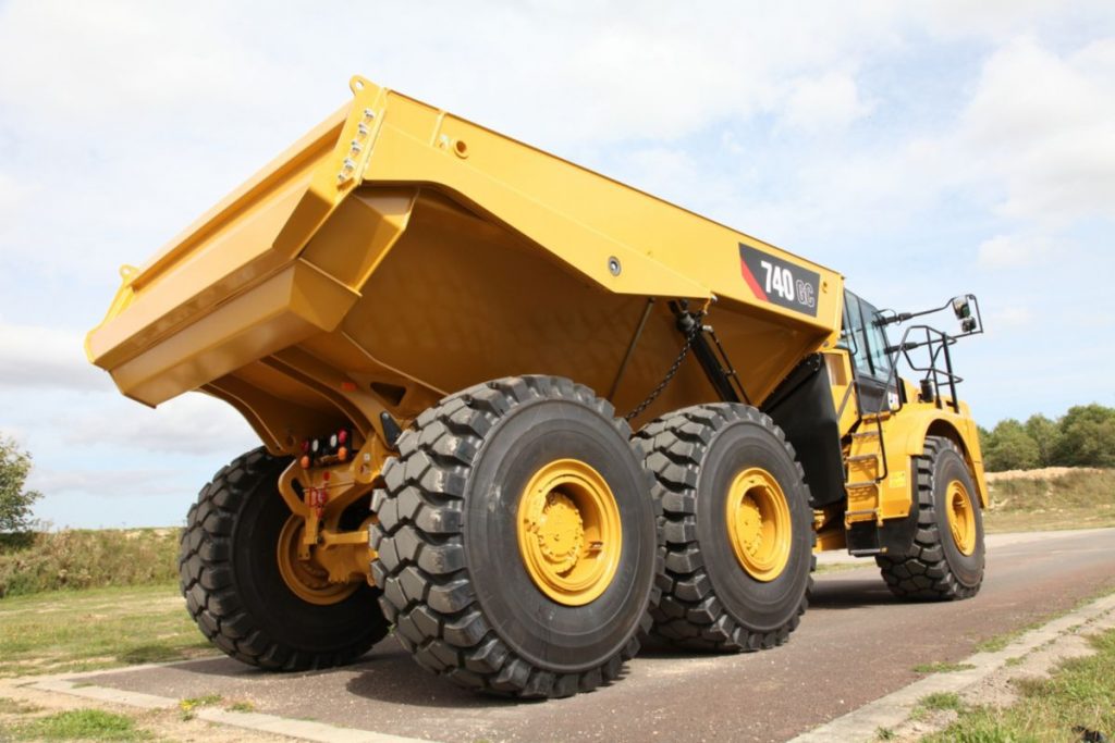 NEW CAT® 740 GC EXPANDS ARTICULATED DUMP TRUCK LINEUP - Machinery Movers